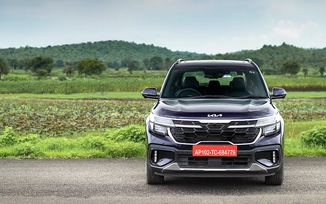 Compare Kia Seltos vs MG Hector vs Tata Nexon EV Prime