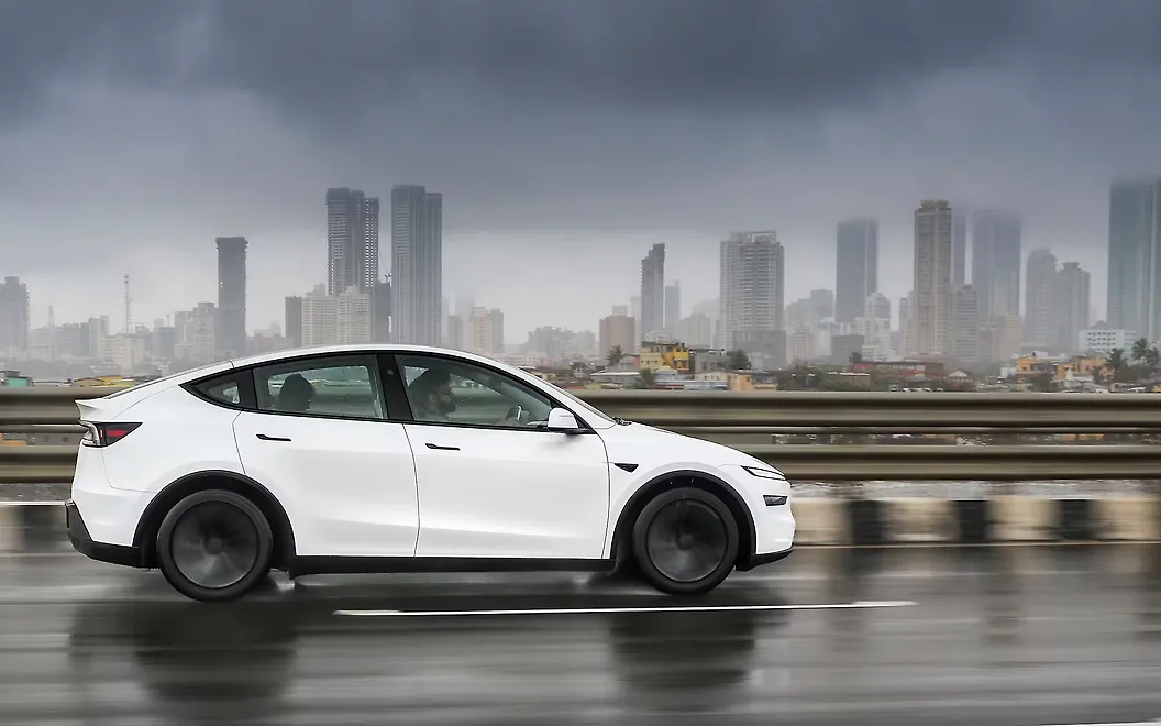 Tesla Model Y - Left View | Tesla Model Y Images