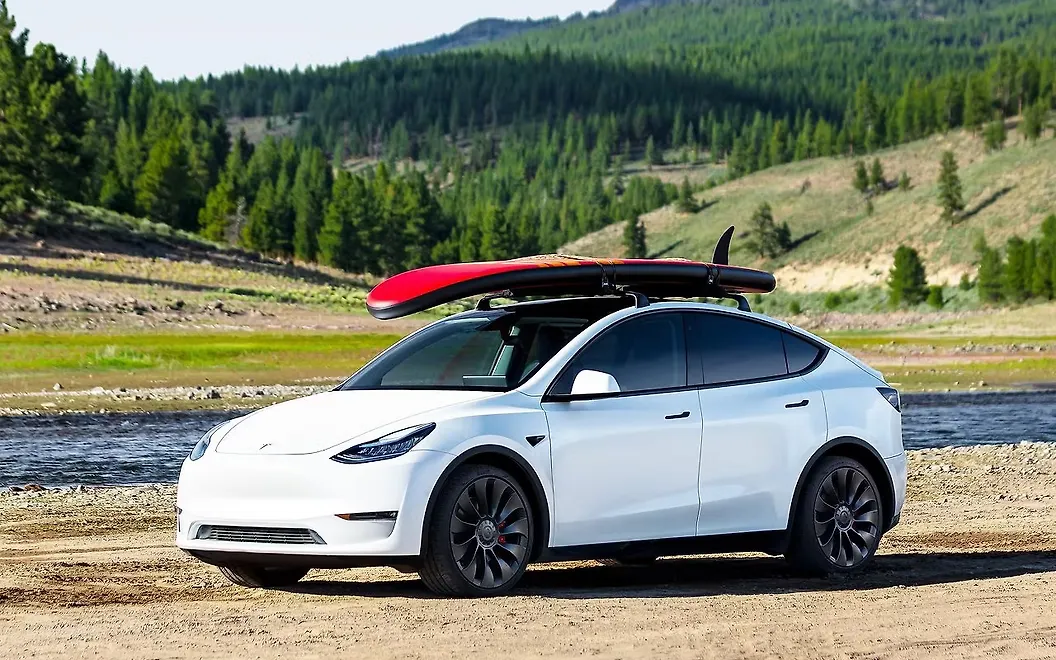 Tesla Model Y - Left View | Tesla Model Y Images
