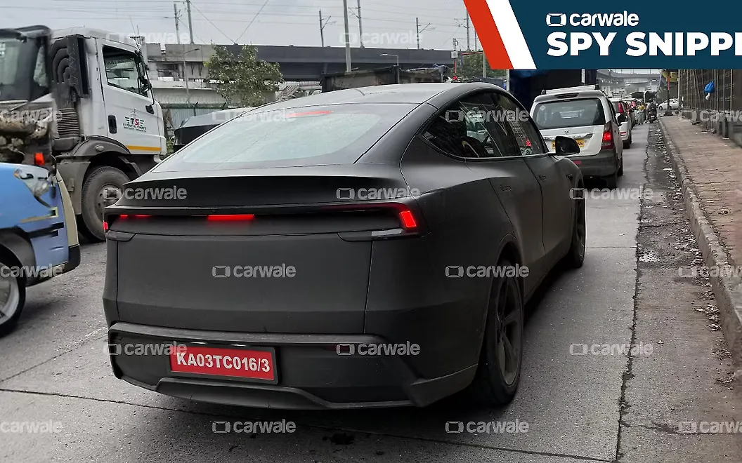 Tesla Model Y - Right Rear View | Tesla Model Y Images